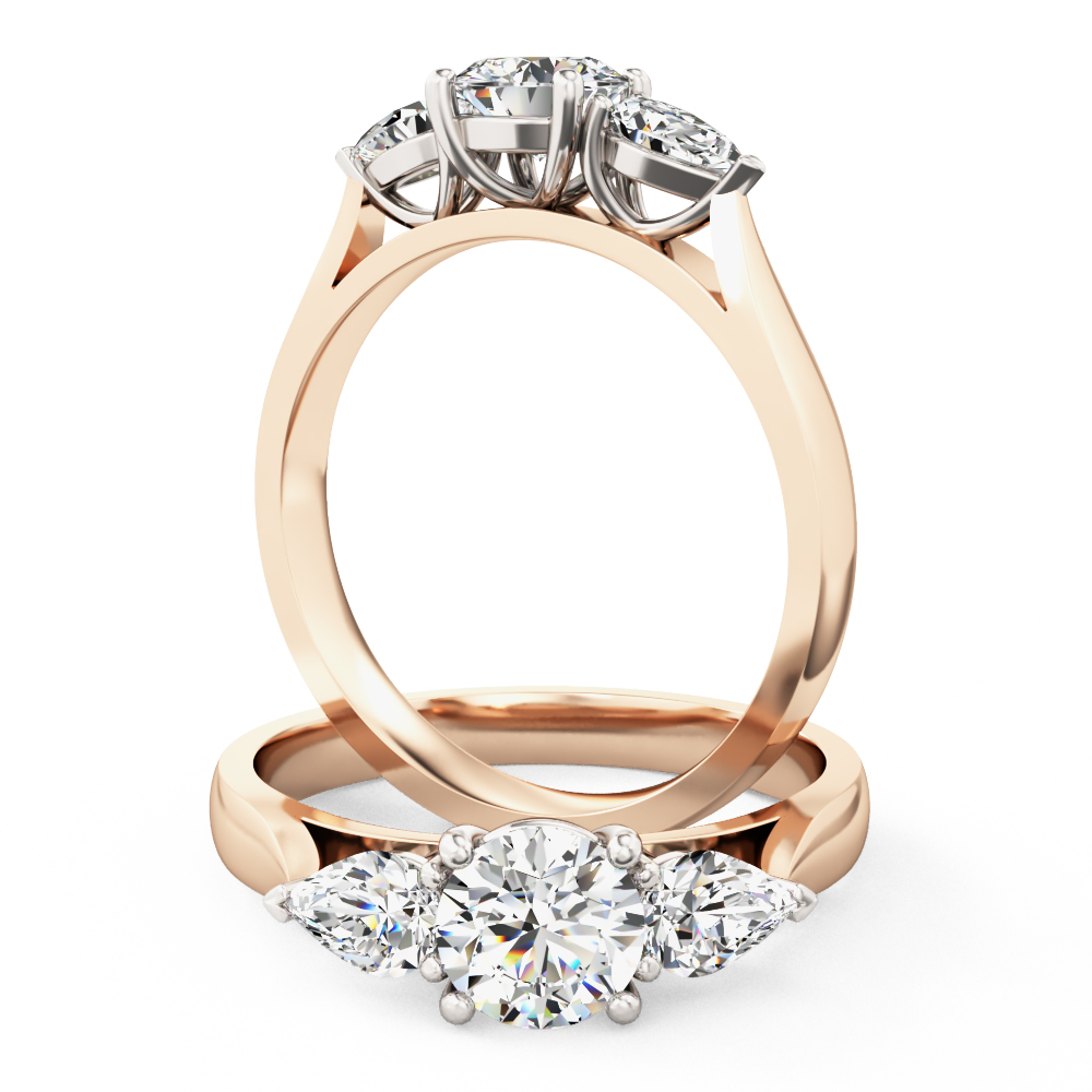 Delightful round cut and pear shaped diamond ring in 18ct rose & white ...