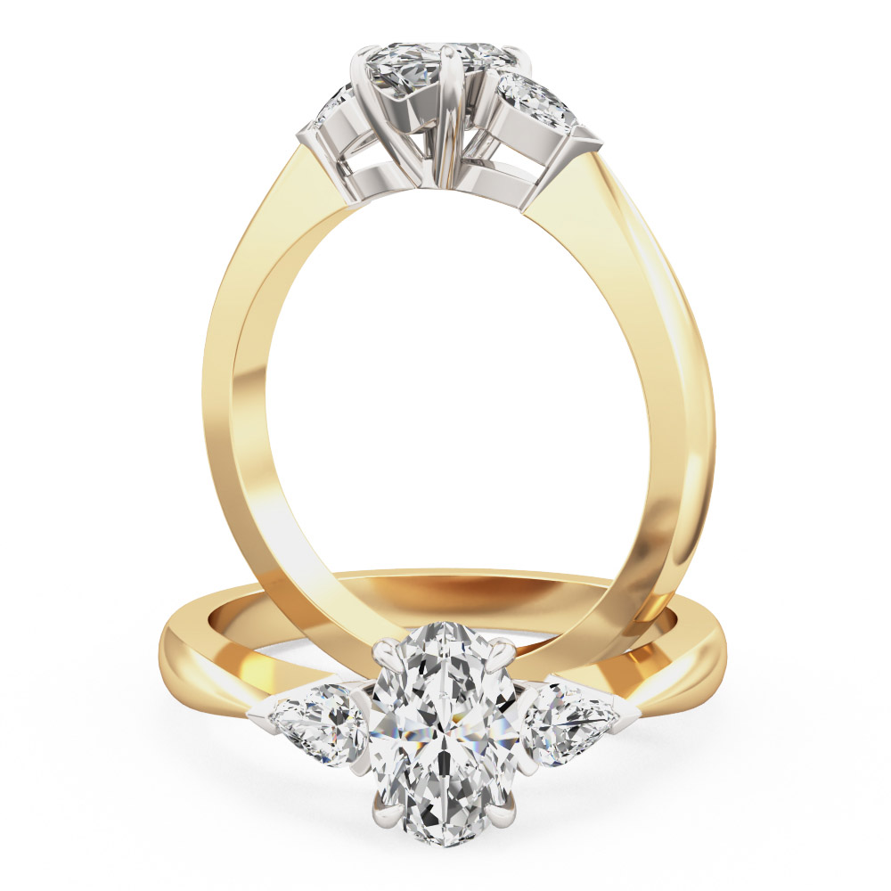 Oval cut diamond ring with pear shoulder stones in 18ct yellow & white ...