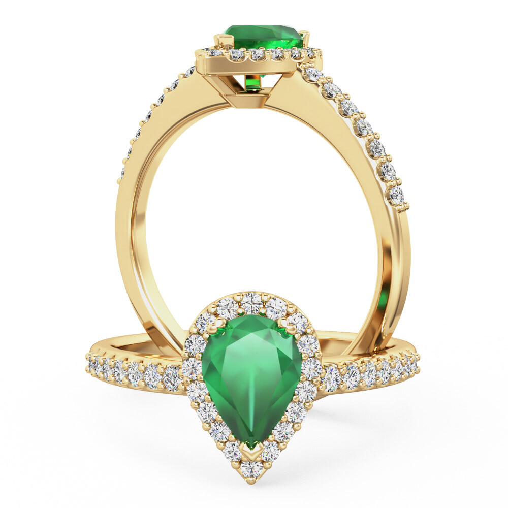 Pear shaped emerald and diamond cluster with shoulder stones in 18ct ...